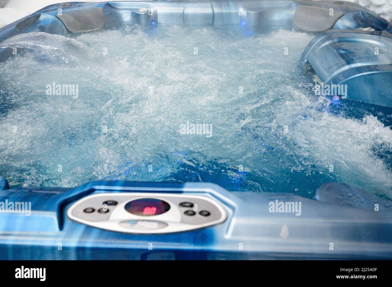 The jacuzzi is gaining water close up, relaxing in the spa, jacuzzi ...