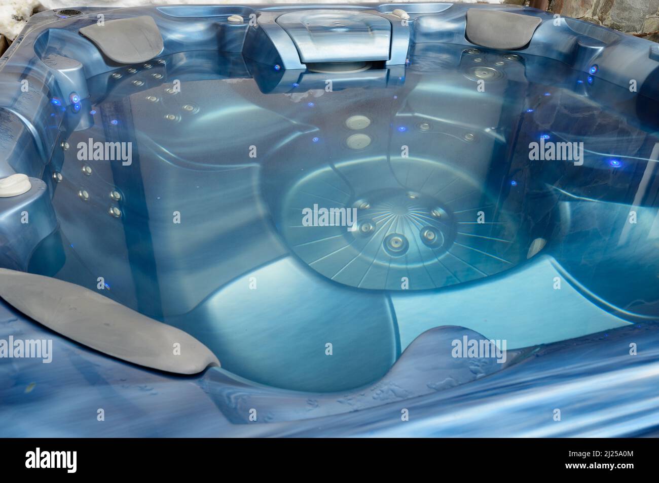 The jacuzzi is gaining water close up, relaxing in the spa, jacuzzi ...