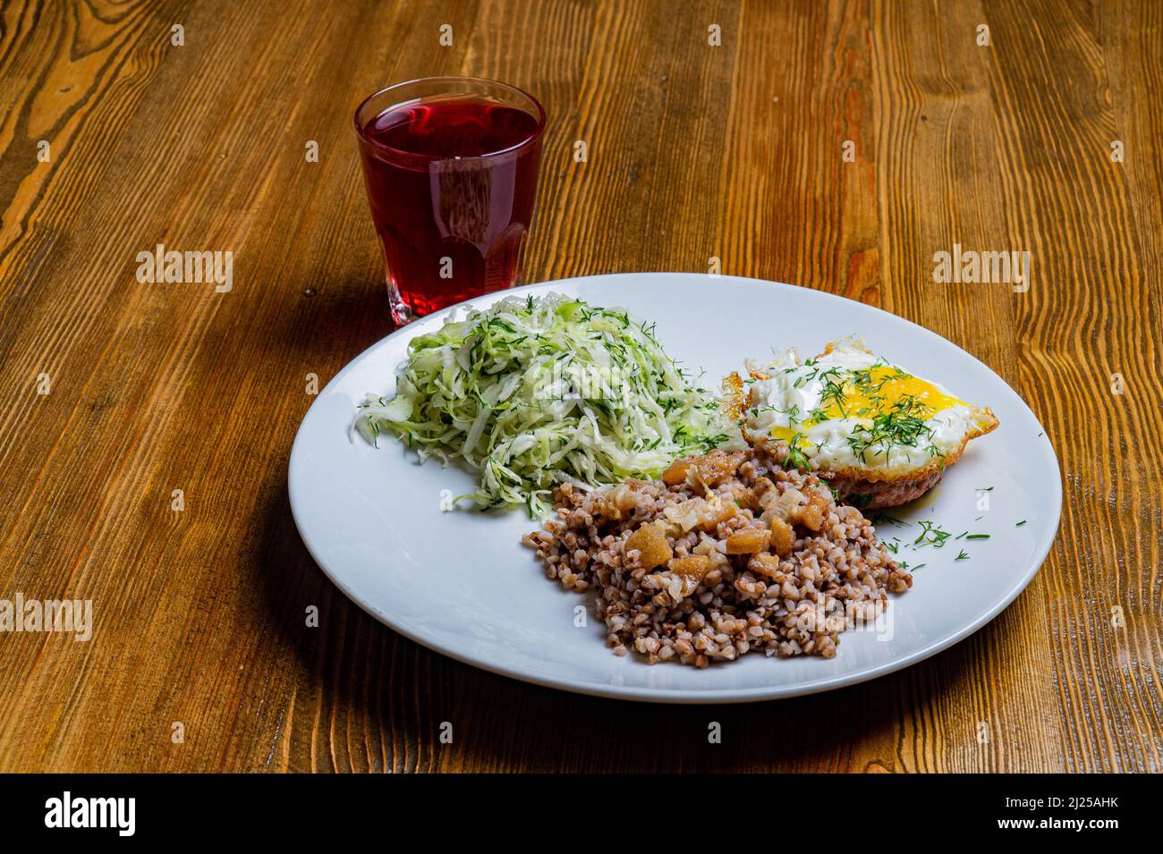 Breakfast including compote, salad, soup Stock Photo - Alamy