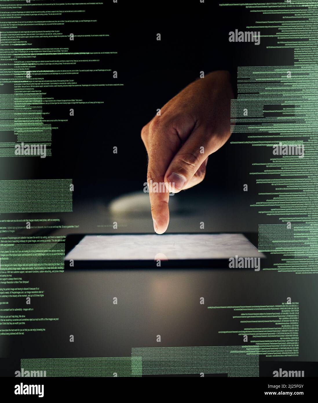 Cracking codes on a different device. Cropped shot of an unrecognizable man cracking a code ...