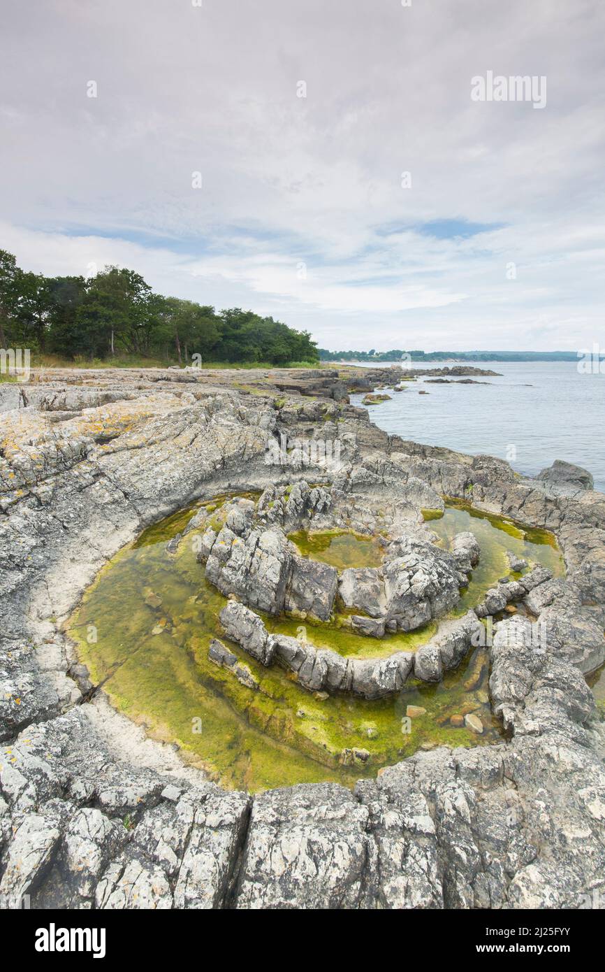 Fossil sand volcano Praestens badkar. Baltic Sea, Scania, Sweden Stock ...