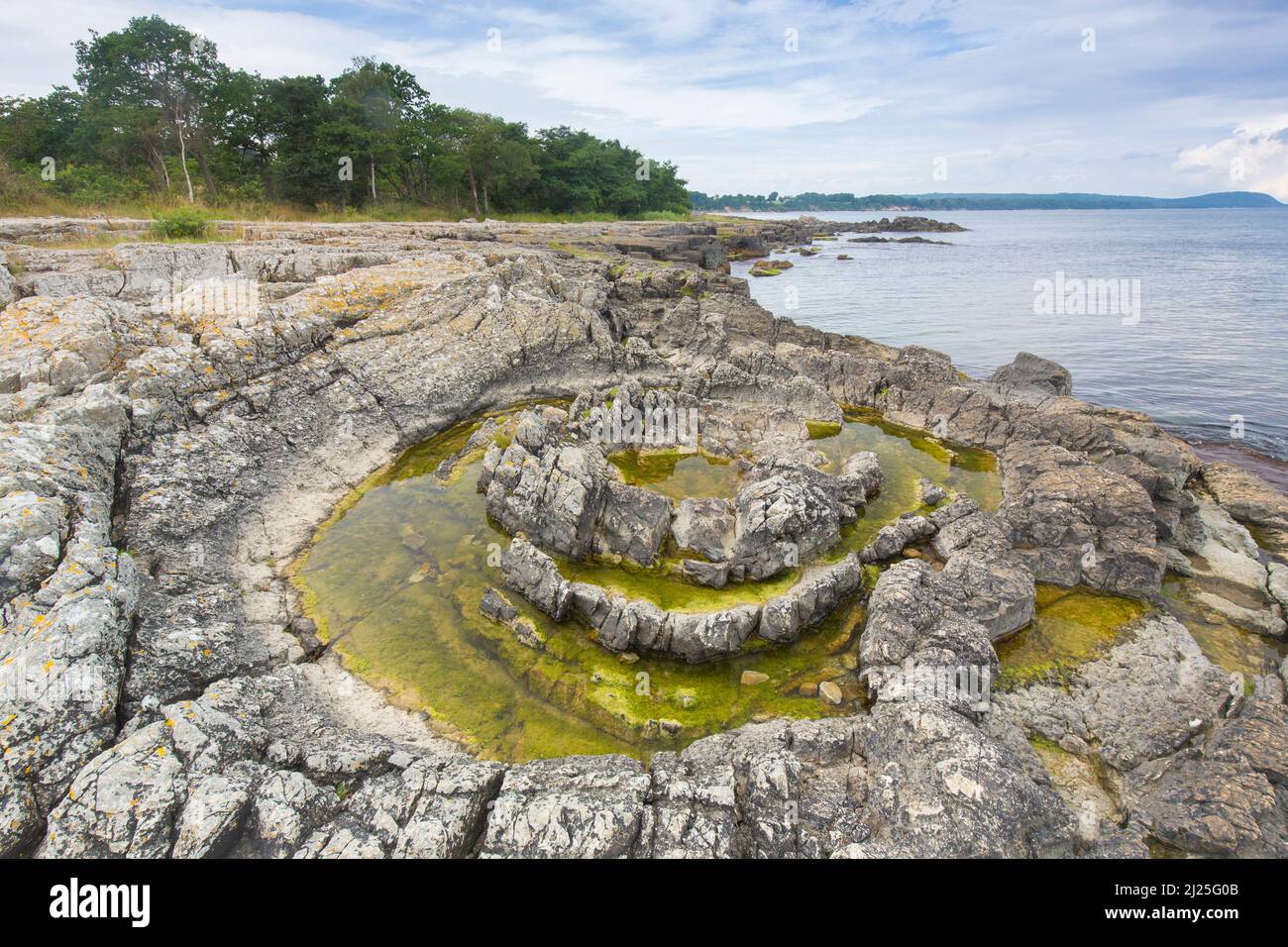Fossil sand volcano Praestens badkar. Baltic Sea, Scania, Sweden Stock ...