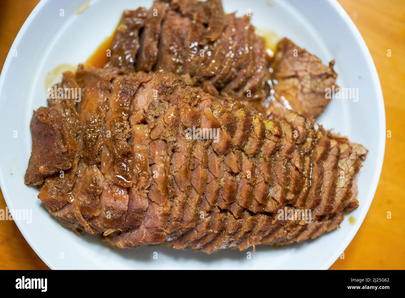 A plate of delicious and mellow sauce beef Stock Photo - Alamy