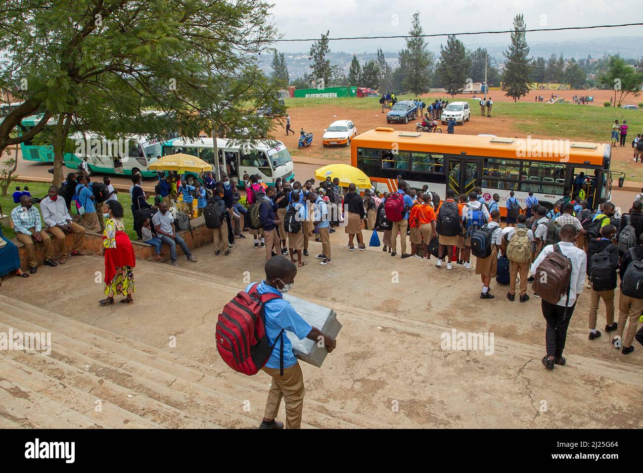 Rwanda, Rwanda. 29th Mar, 2022. Secondary students wait to take a bus ...