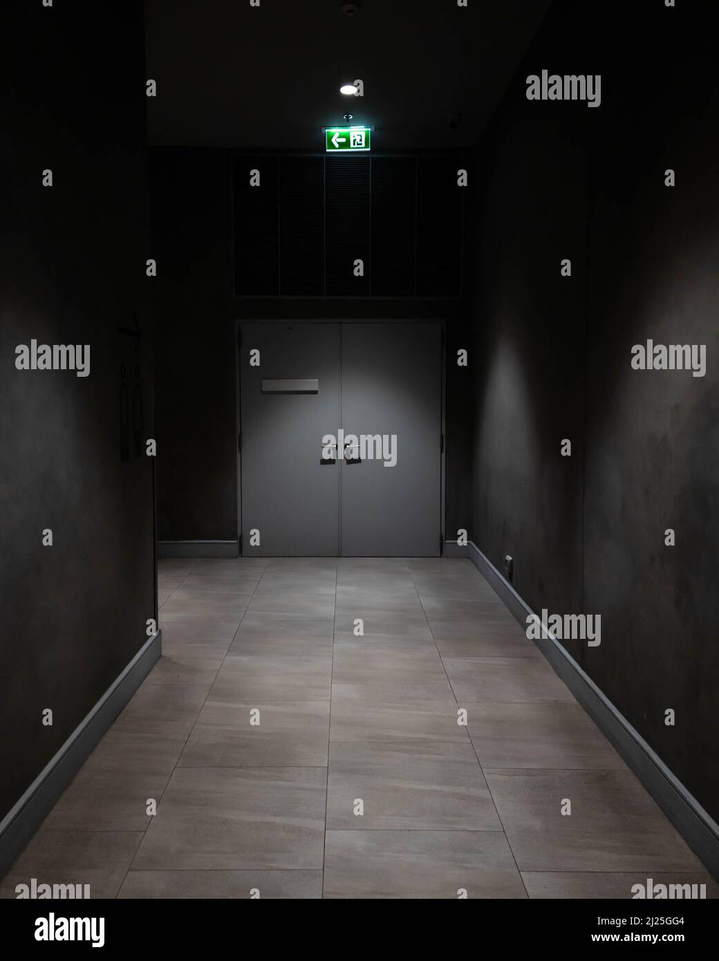 Emergency fire exit way corridor in commercial building Stock Photo - Alamy