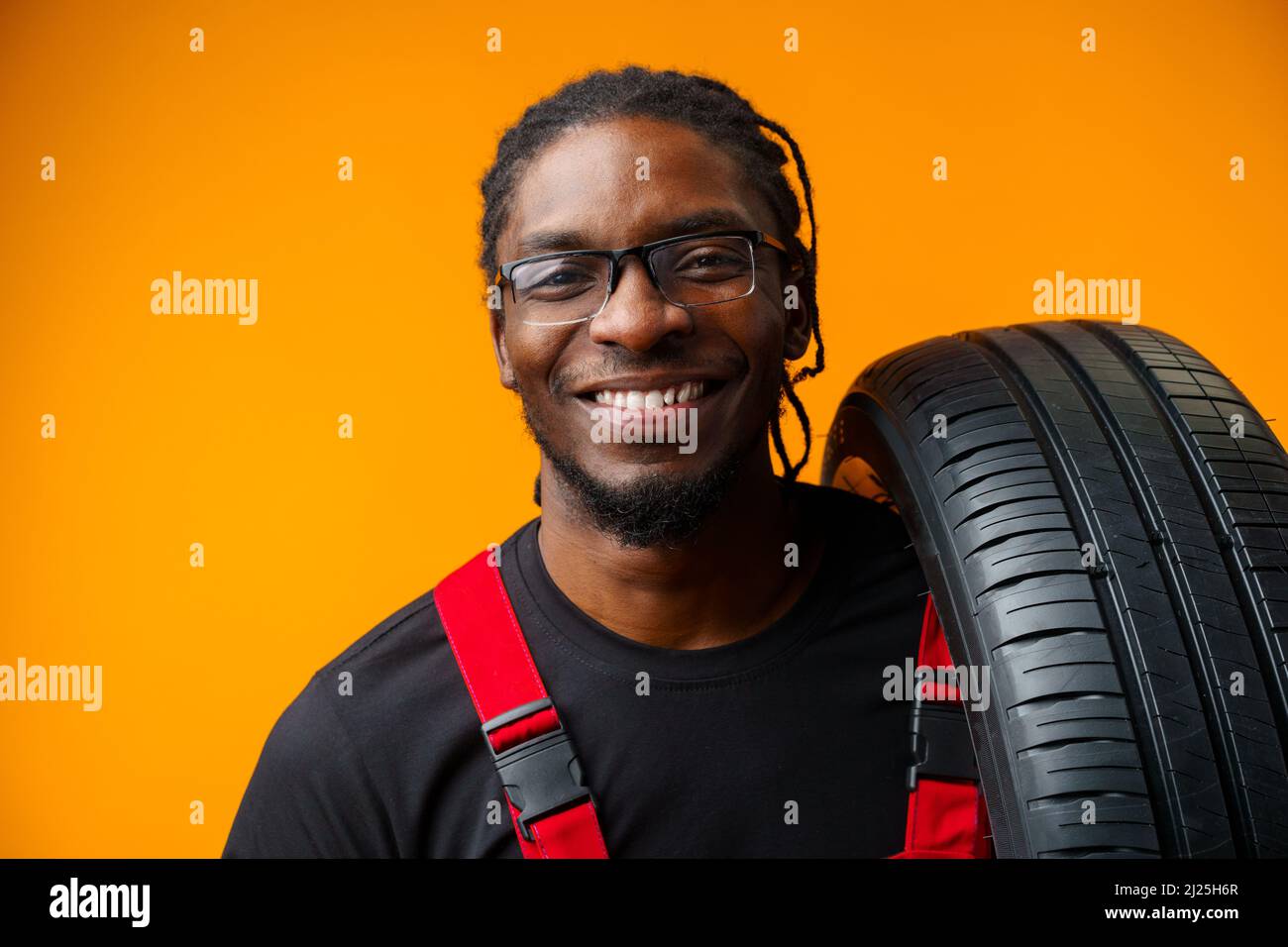 Car salesman and tyres hi-res stock photography and images - Alamy
