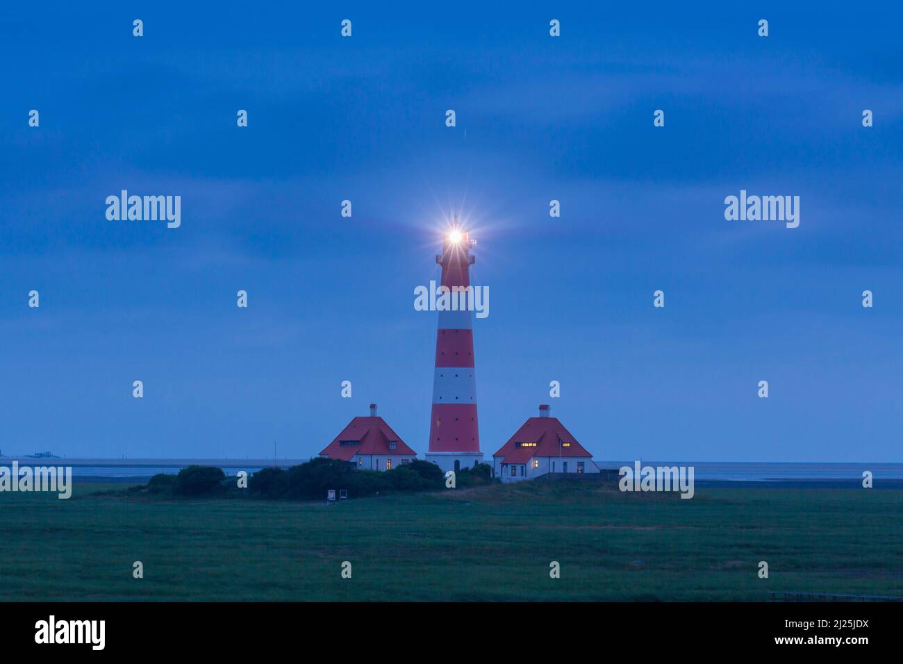 Lighthouse Westerhever at night. Wadden Sea National Park, Peninsula of ...