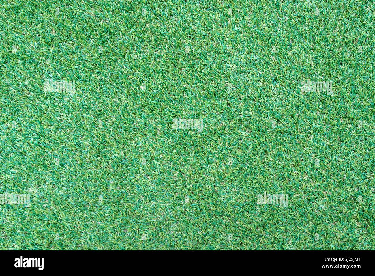 Panorama of New Green Artificial Turf Flooring texture and background ...