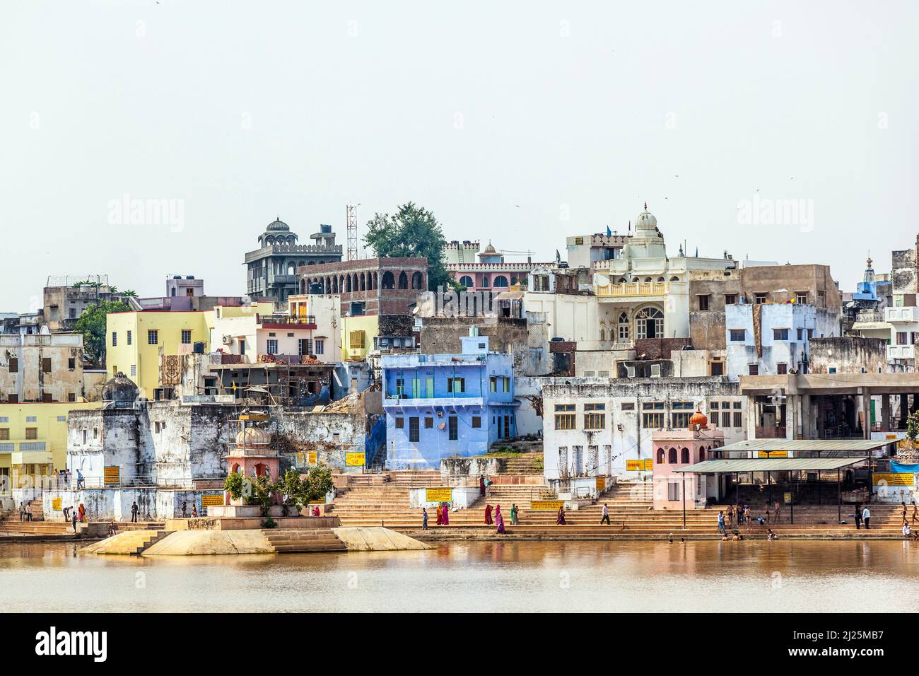 Pushkar, India - October 20, 2012: Pilgrims take ritual bathing in holy ...