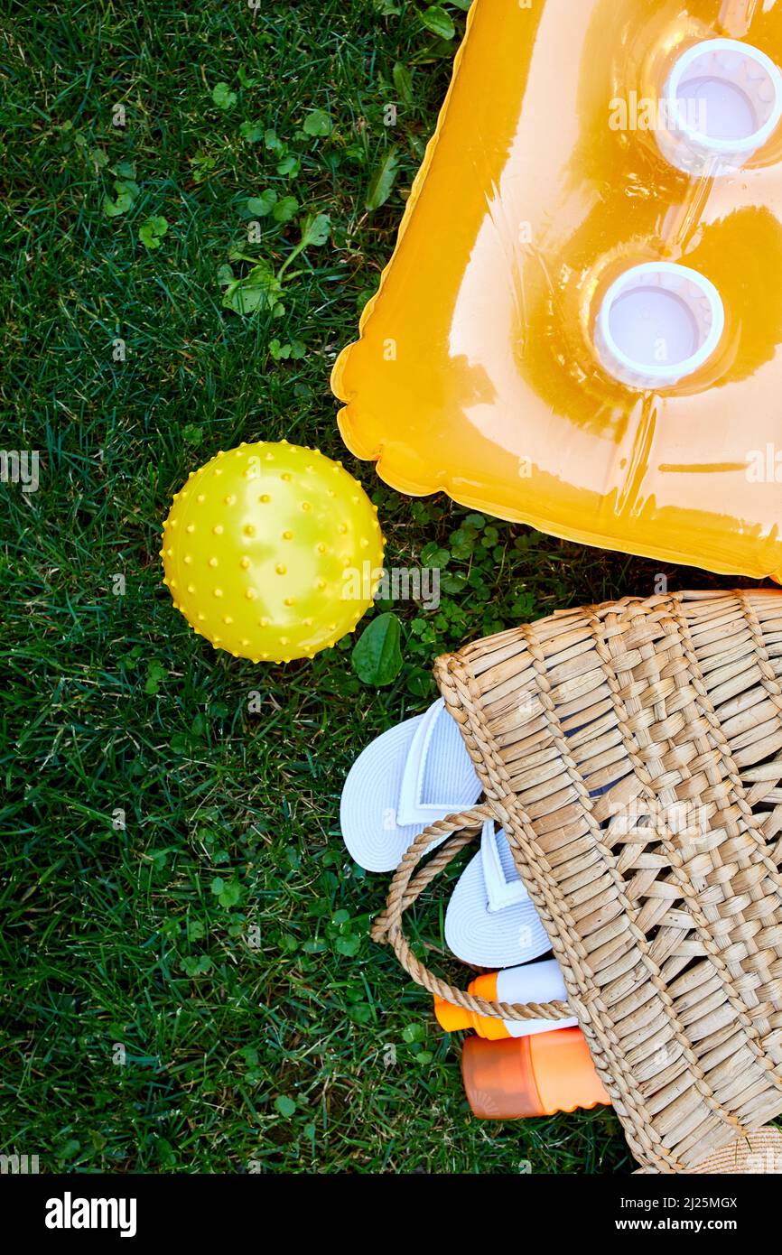 Flat lay of outdoor bright summer beach vacation or travel lifestyle ...