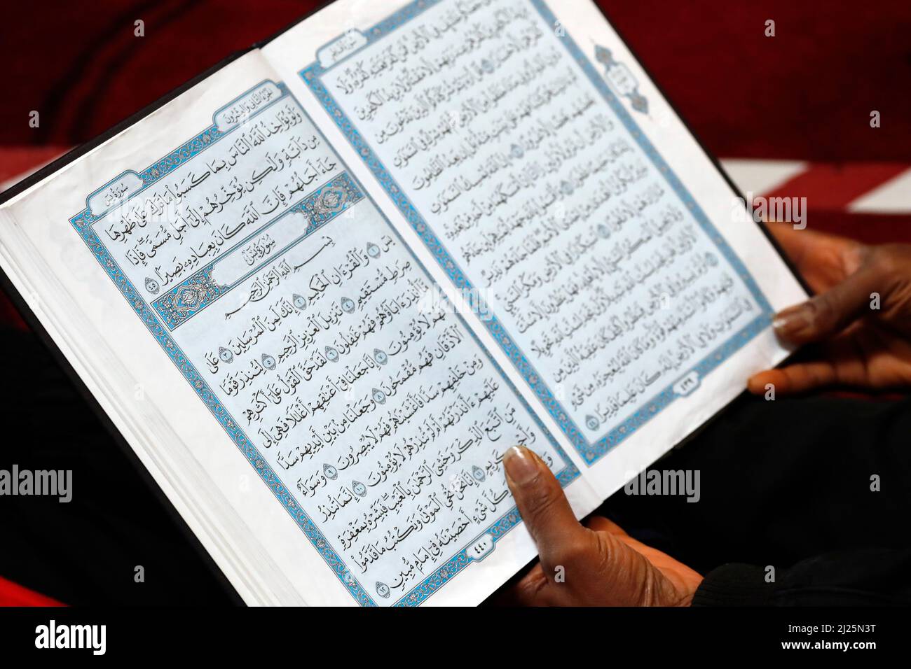 Muslim reading the holy Quran in mosque Stock Photo - Alamy