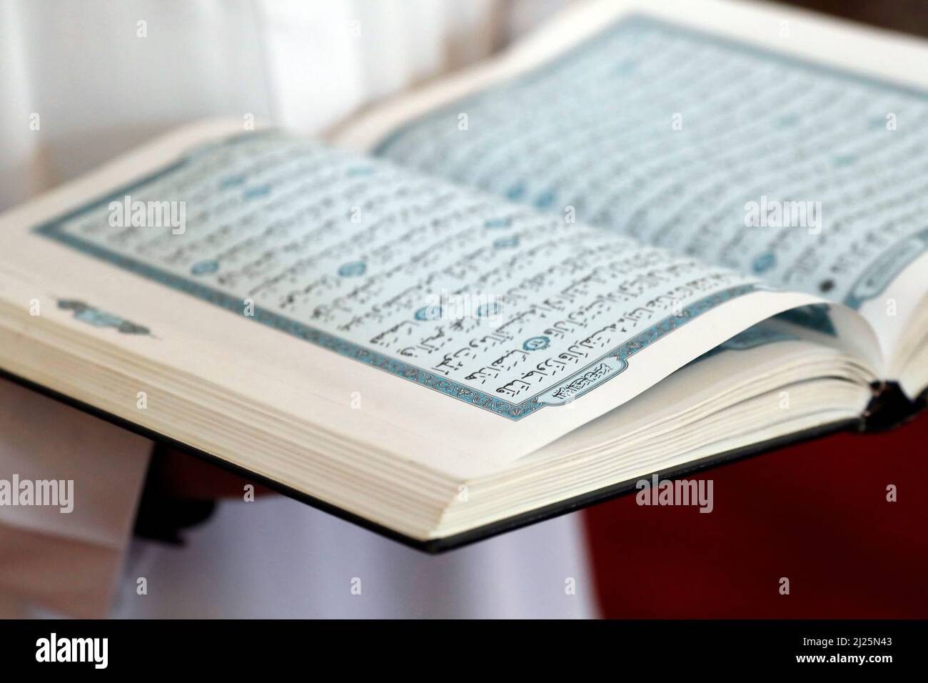 Muslim reading the holy Quran in mosque Stock Photo - Alamy