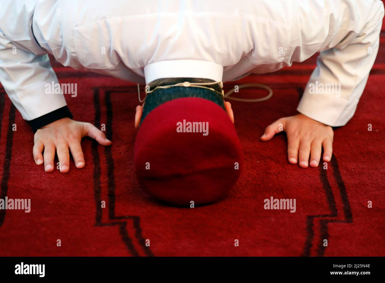 Geneva mosque. Imam praying Stock Photo - Alamy