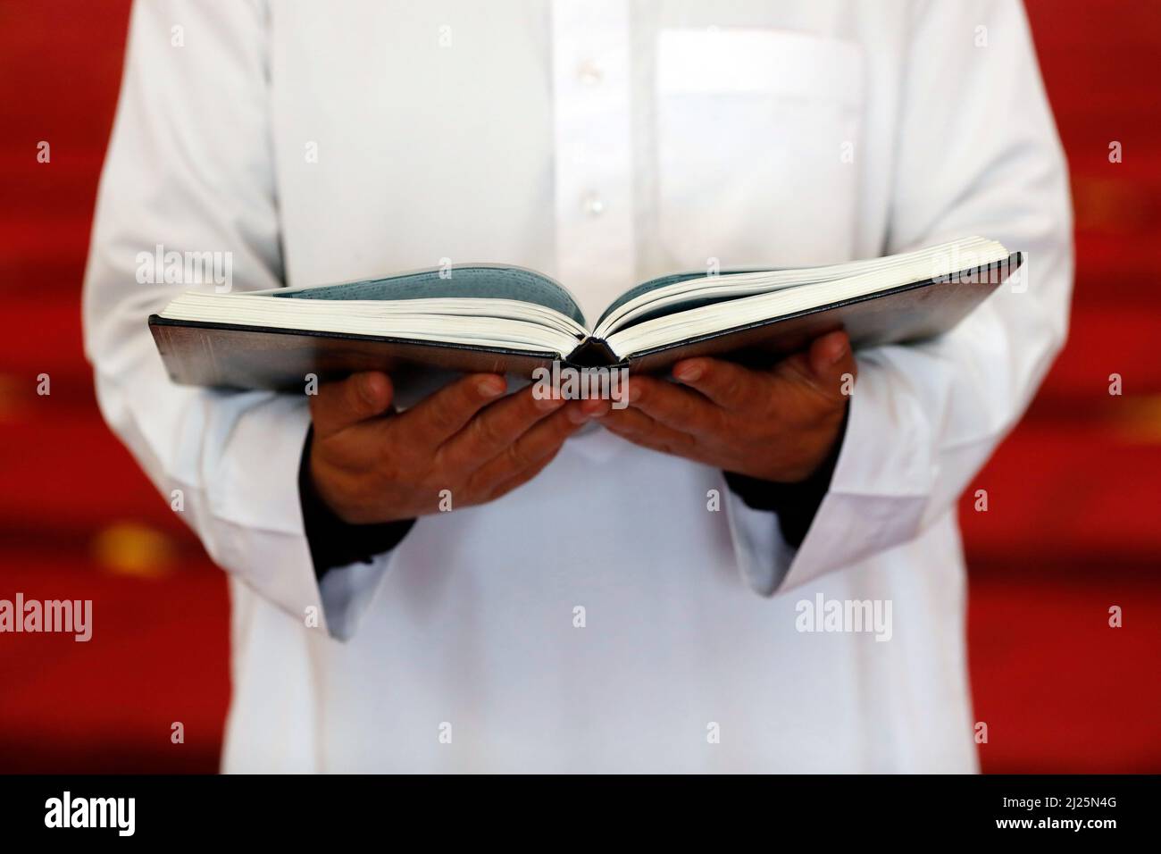 Muslim reading the holy Quran in mosque Stock Photo - Alamy