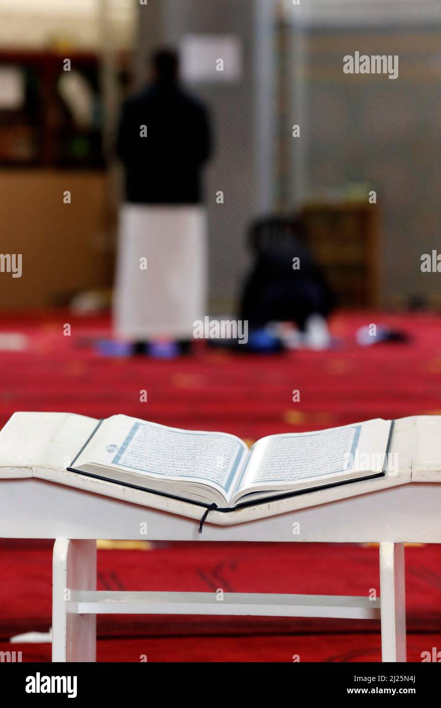 Prayer room and open Quran at the Geneva mosque Stock Photo - Alamy