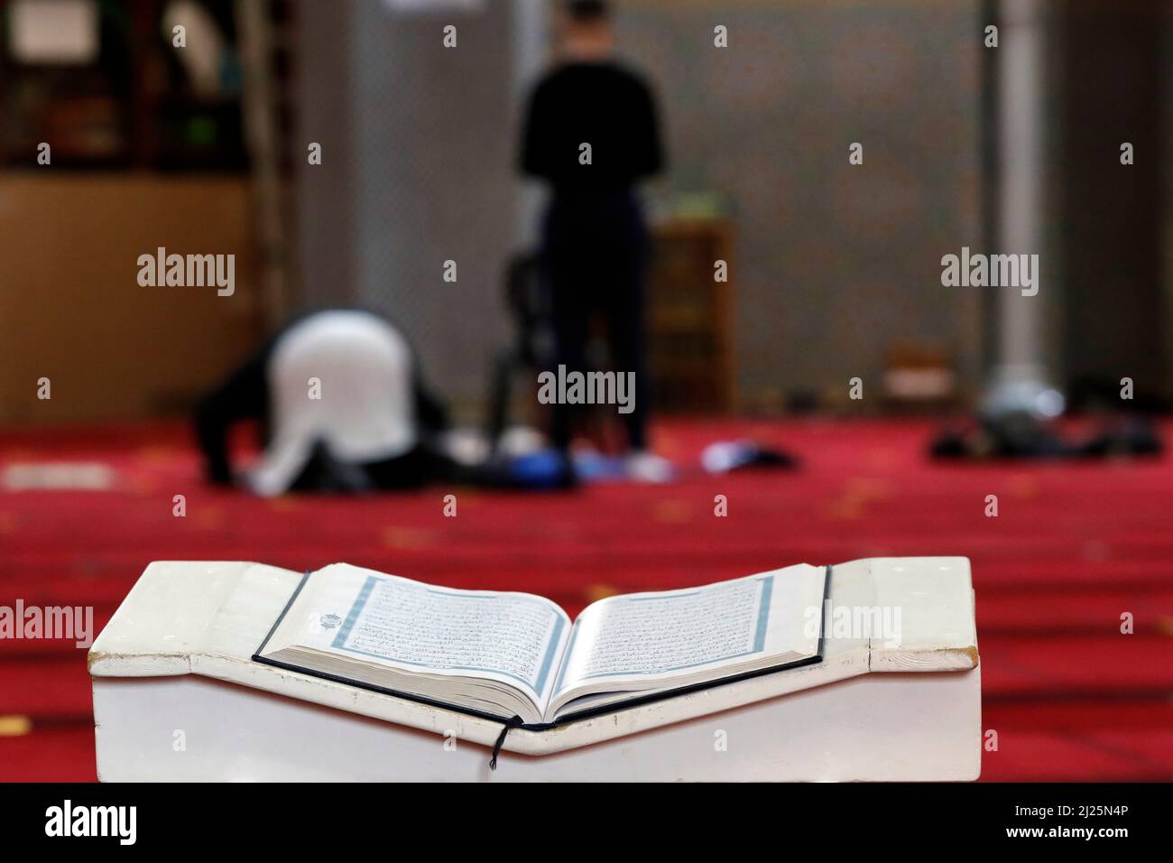 Prayer room and open Quran at the Geneva mosque Stock Photo - Alamy