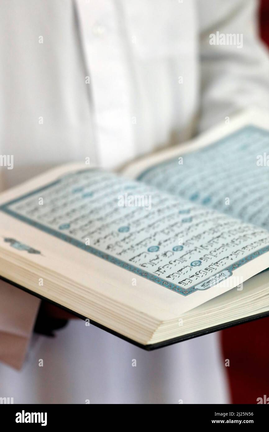 Muslim reading the holy Quran in mosque Stock Photo - Alamy