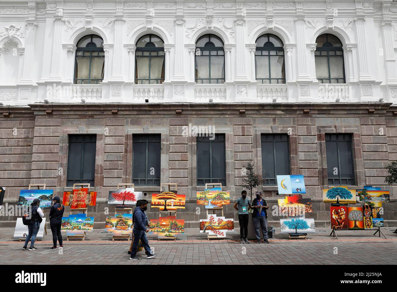 Painters selling art in Quito, Ecuador Stock Photo - Alamy