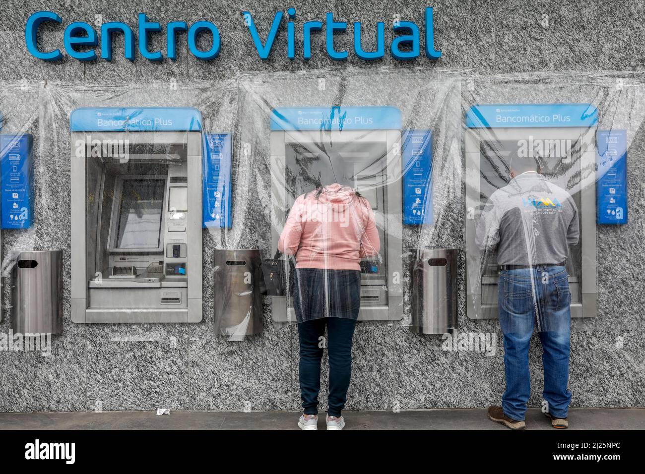 ATMs with covid-19 protection in Riobamba, Ecuador Stock Photo - Alamy