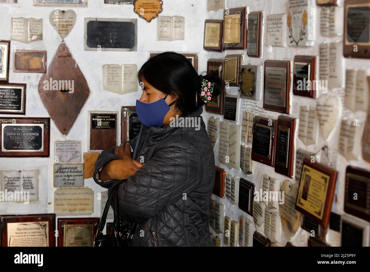 Woman praying in the Ascension Carmen monastery sanctuary, Cuenca ...