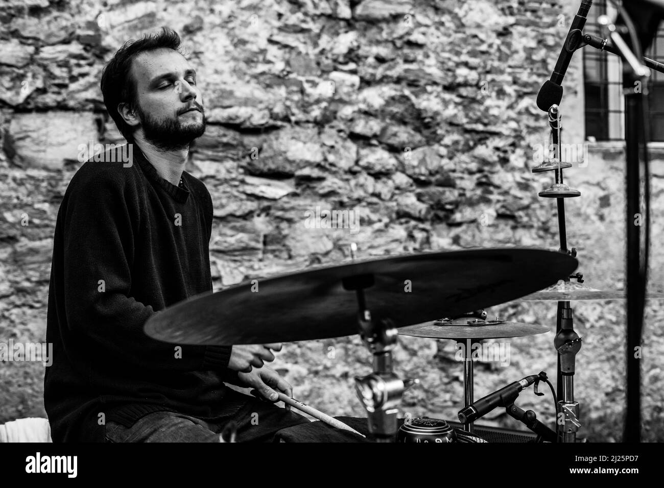 Handsome man with drumsticks hi-res stock photography and images - Alamy