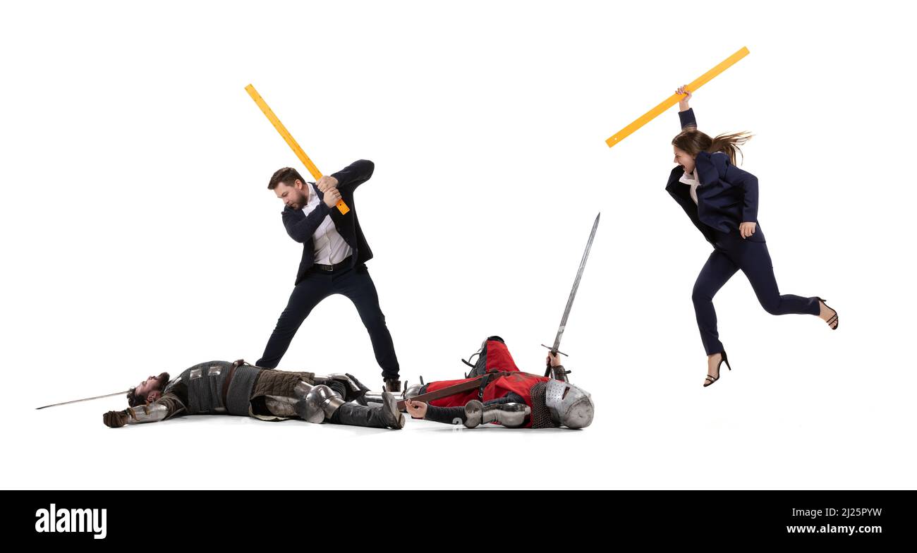 Modern versus medieval. Young male and female office managers and ...