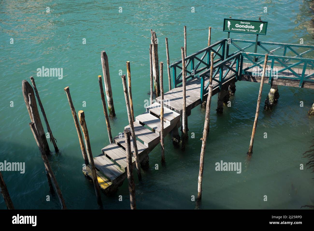 Spindly Wooden Jetty at the Gondola station next to Accademia Bridge ...