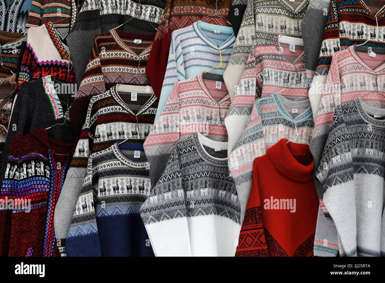 Sweaters sold at Otavalo market, Ecuador Stock Photo - Alamy