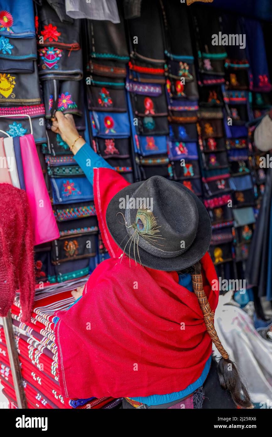 Indigenous shopkeeper in the center of Riobamba, Ecuador Stock Photo ...