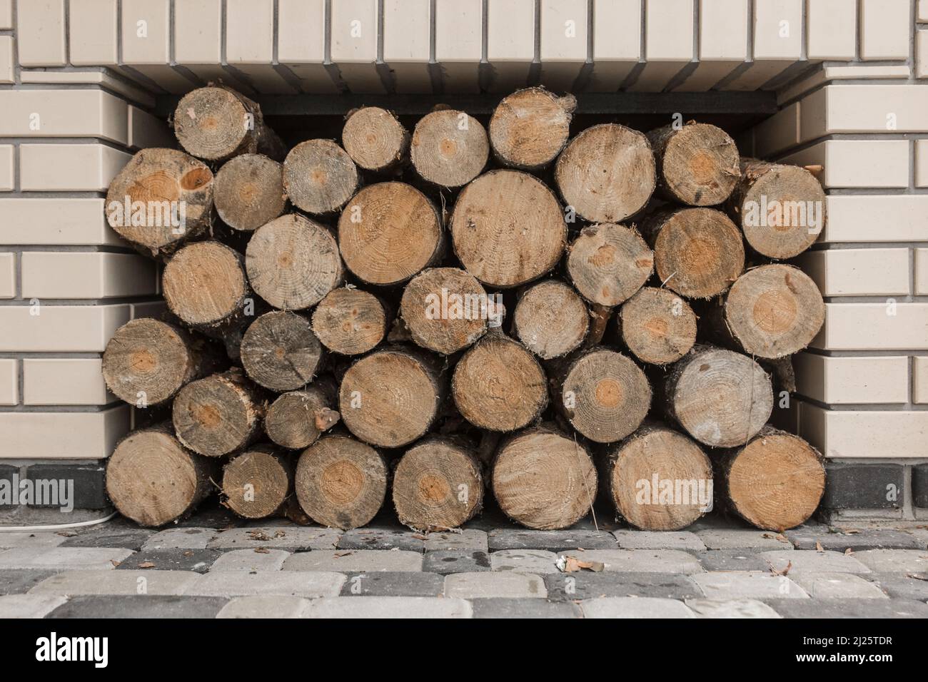 Timber round logs tree wood forest background lumber Stock Photo - Alamy