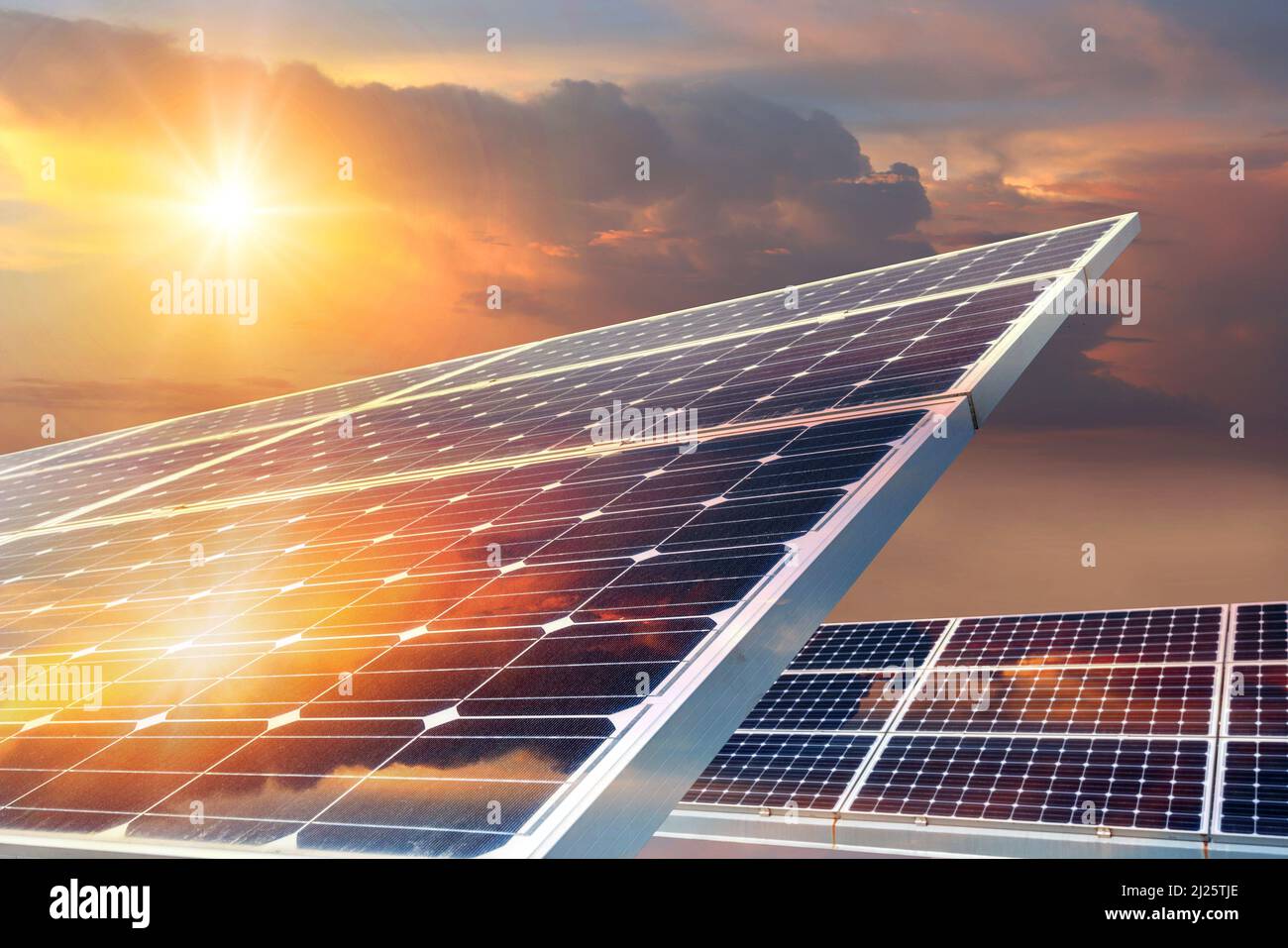 Photo collage of sunset and solar panel, photovoltaic, alternative ...