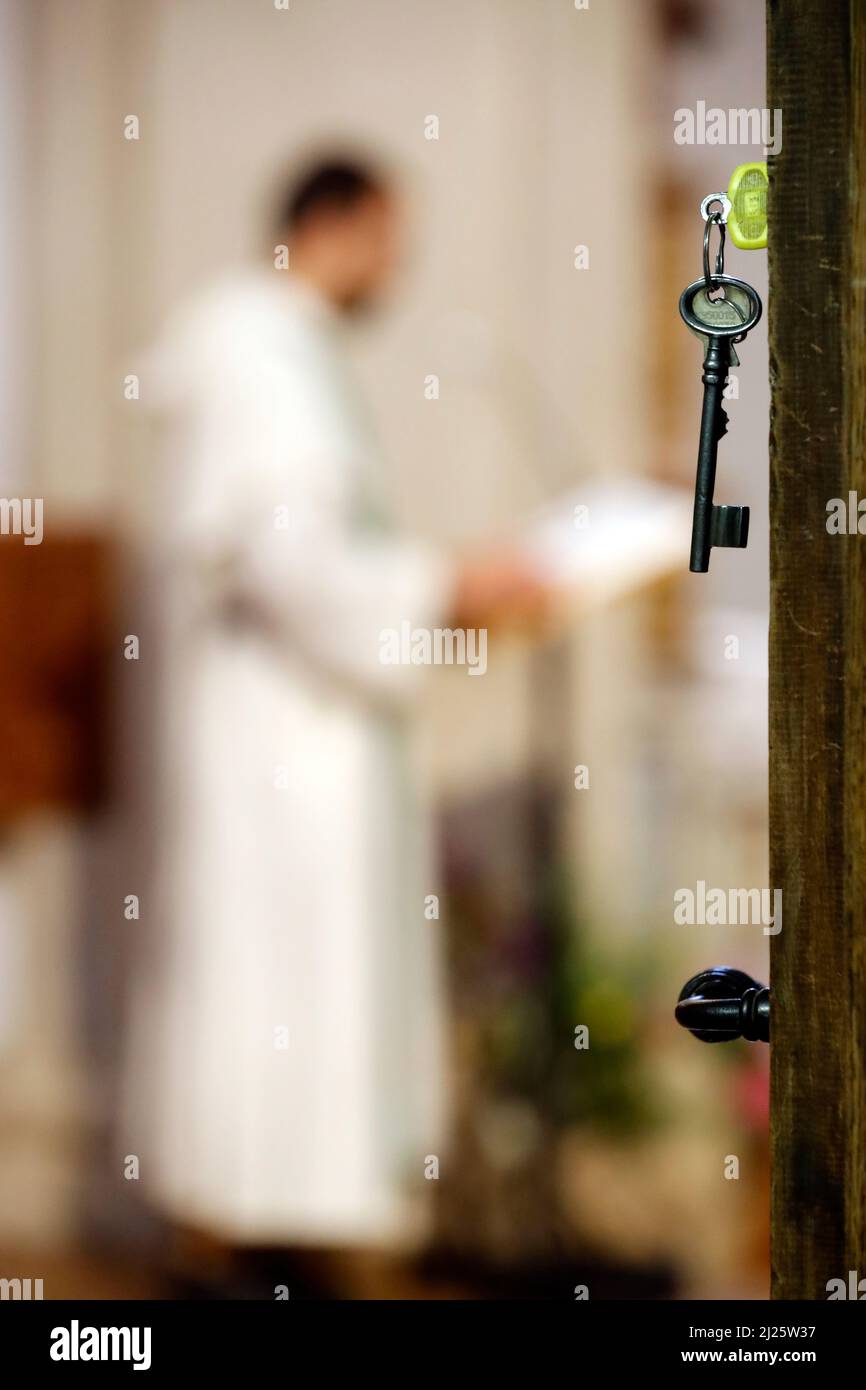 Catholic church. Key on the door of the sacristy. Catholic mass Stock ...
