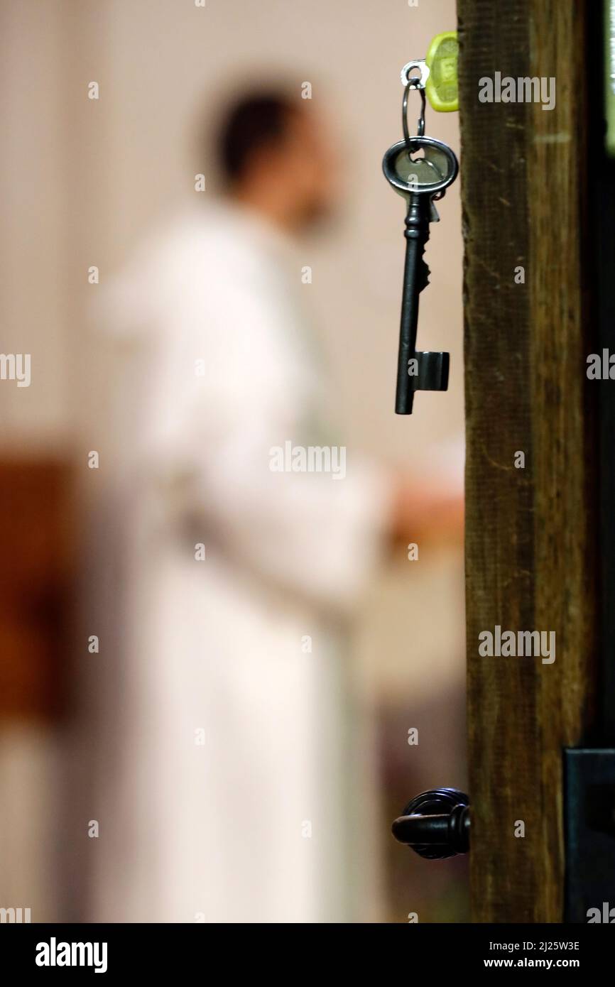 Catholic church. Key on the door of the sacristy. Catholic mass Stock ...