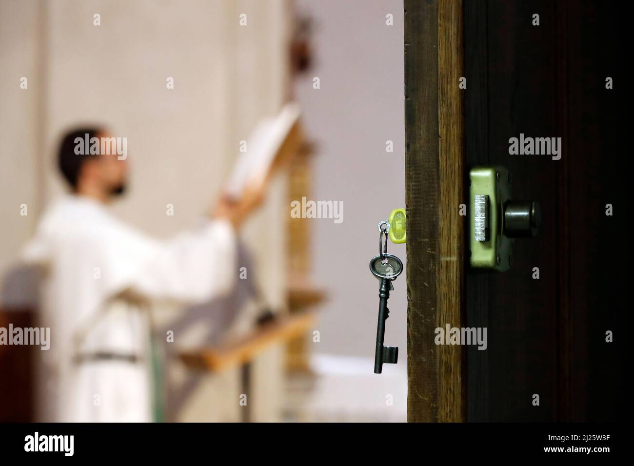 Catholic church. Key on the door of the sacristy. Catholic mass Stock ...