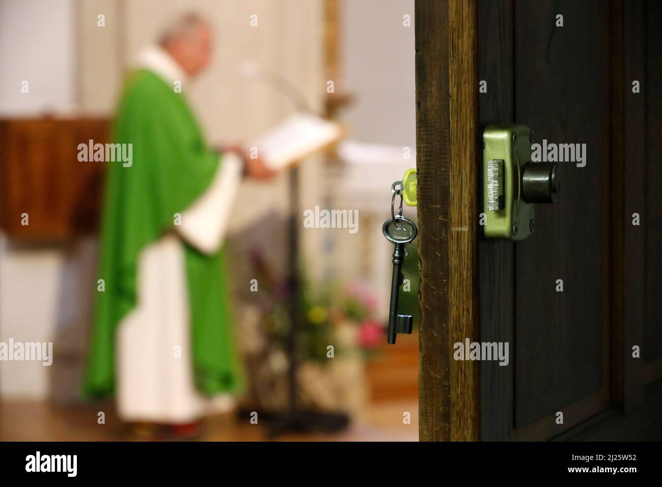Catholic church. Key on the door of the sacristy. Catholic mass Stock ...