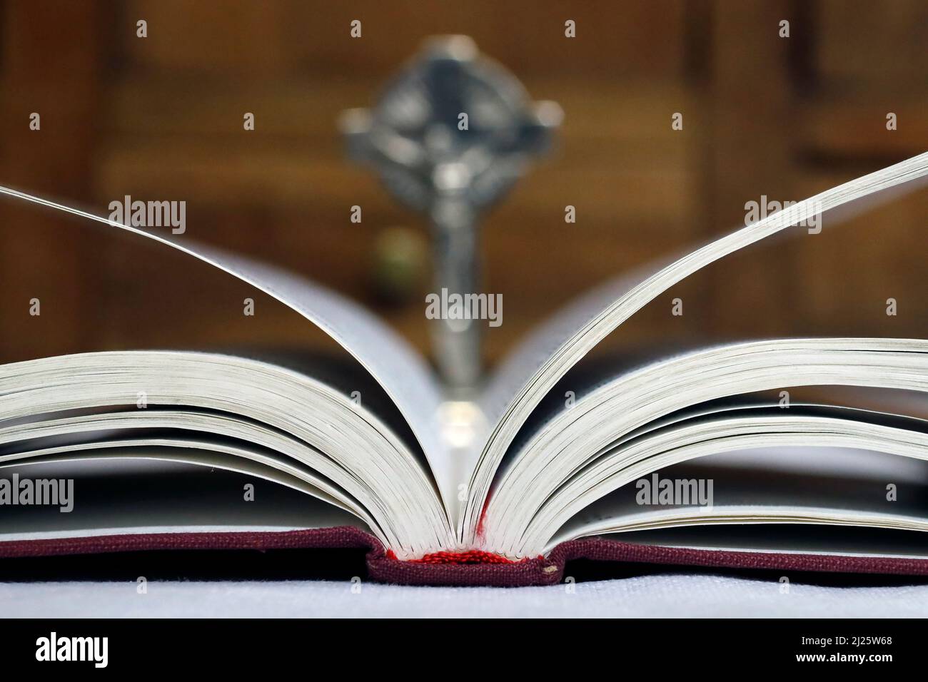 Sacristy of catholic church. Open bible Stock Photo - Alamy