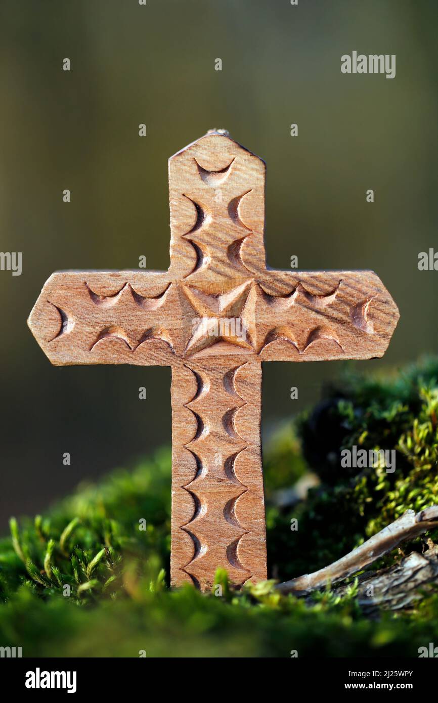 Christian wooden cross in nature. Symbol of chritianism Stock Photo - Alamy