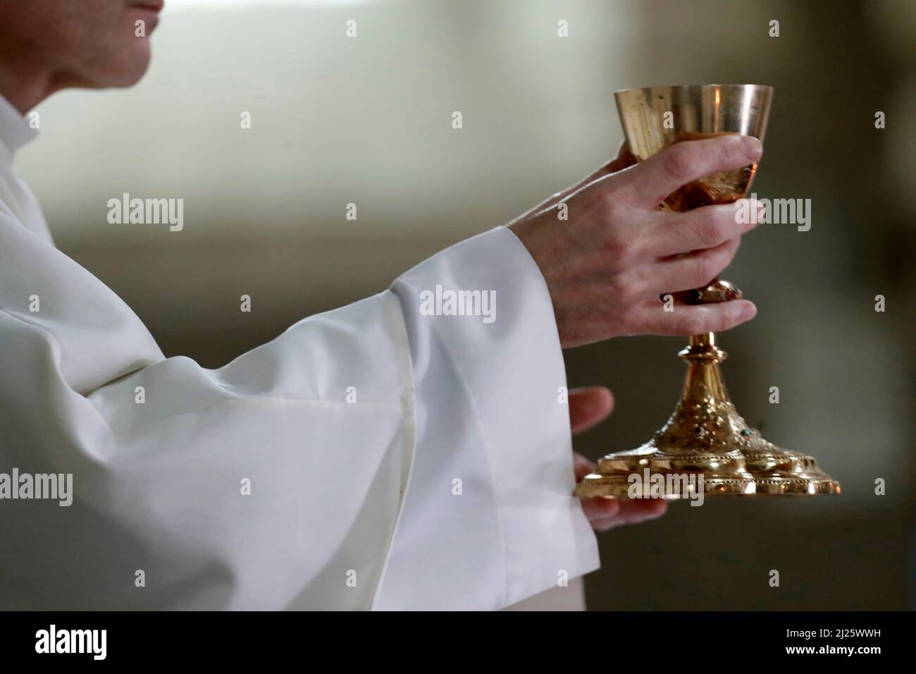 Catholic priest. Eucharist celebration in church Stock Photo - Alamy