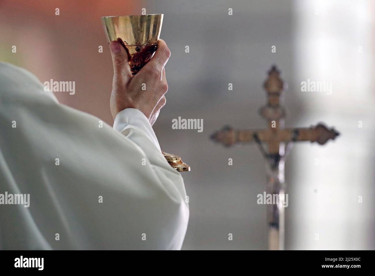 Catholic priest. Eucharist celebration in church Stock Photo - Alamy