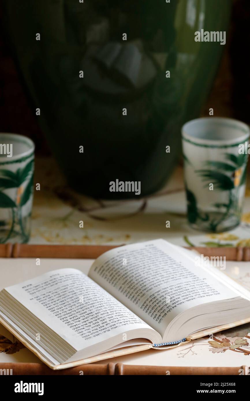 Open torah on a table. Jewish book Stock Photo - Alamy