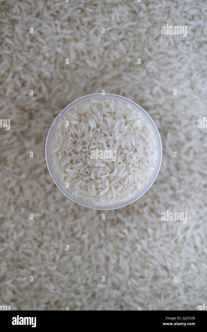 Rice for sale with a plastic cup Stock Photo - Alamy