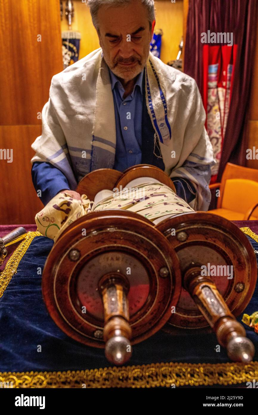 Rabbi unrolling sefer torah scrolls, Paris, France Stock Photo - Alamy