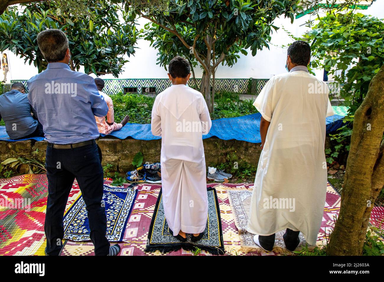 Eid prayer in the garden of the Paris Great Mosque, France Stock Photo ...