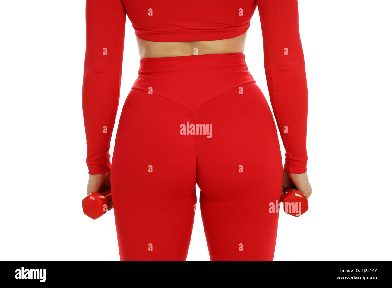 Sporty woman in red outfit isolated on white background Stock Photo - Alamy