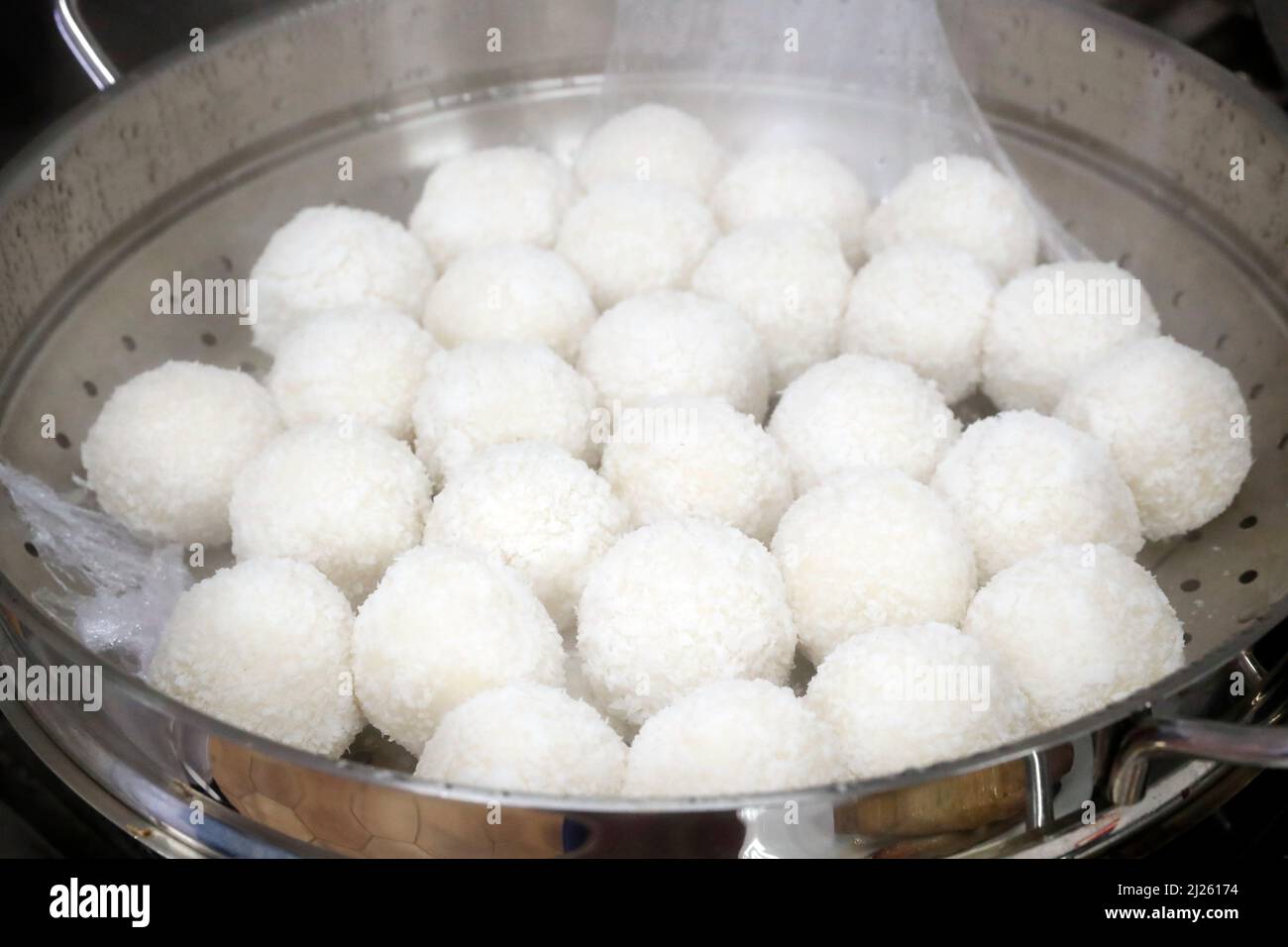Asian cuisine. Vietnamese coconut steamed bowls Stock Photo - Alamy