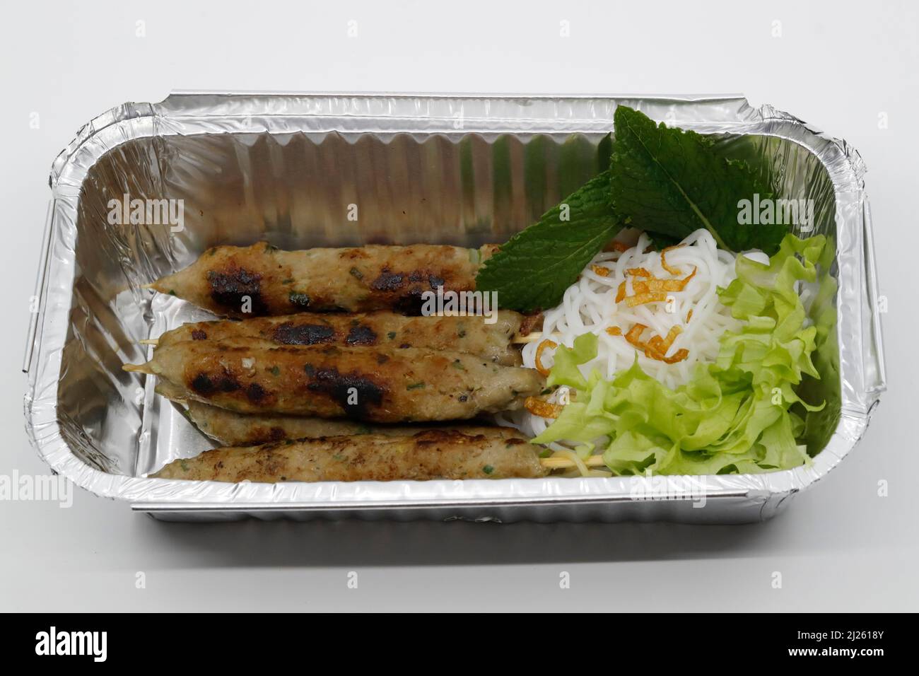 Asian cuisine. Vietnamese fresh meat brochettes for BBQ Stock Photo - Alamy