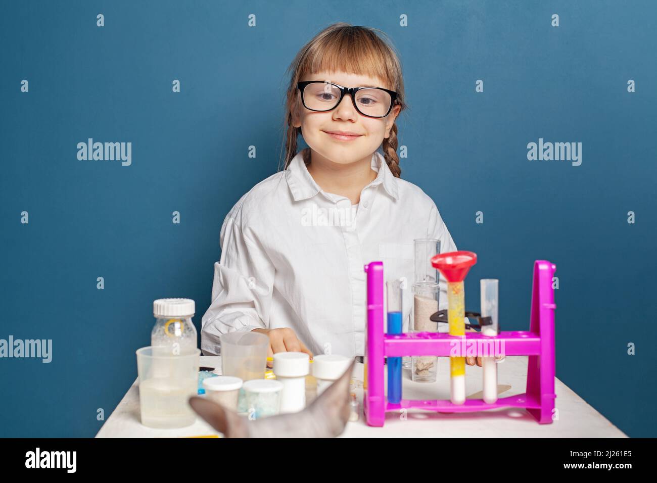 Smart girl with science lab experiment. Science and education concept ...