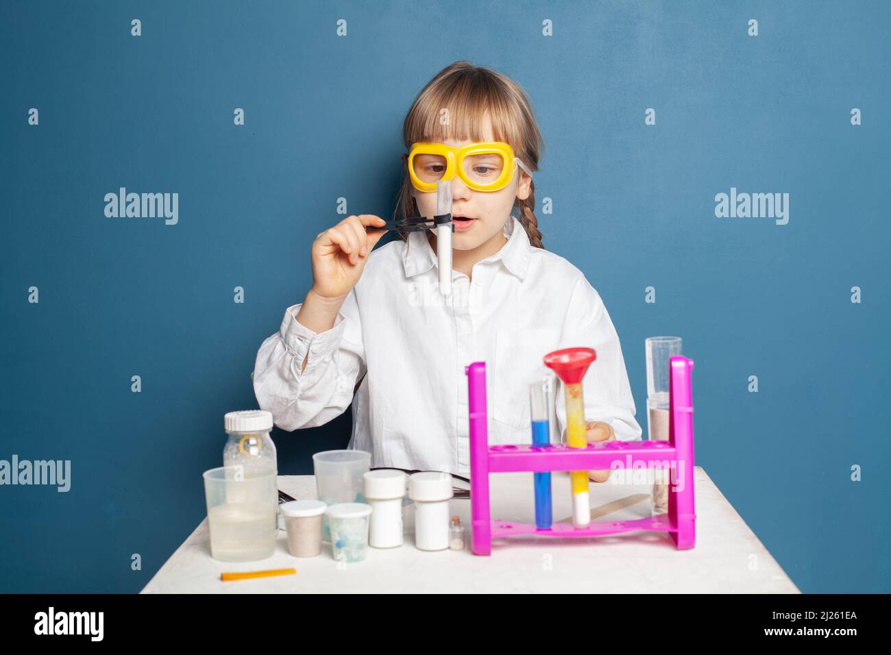 Clever child girl with science experiment Stock Photo - Alamy