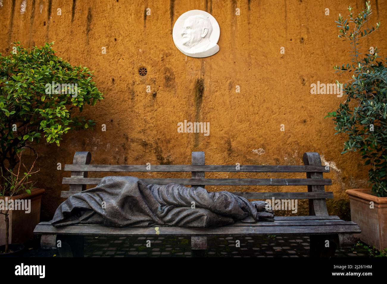 Courtyard of the Almsgiving (Elemosineria), statue of Jesus as a ...