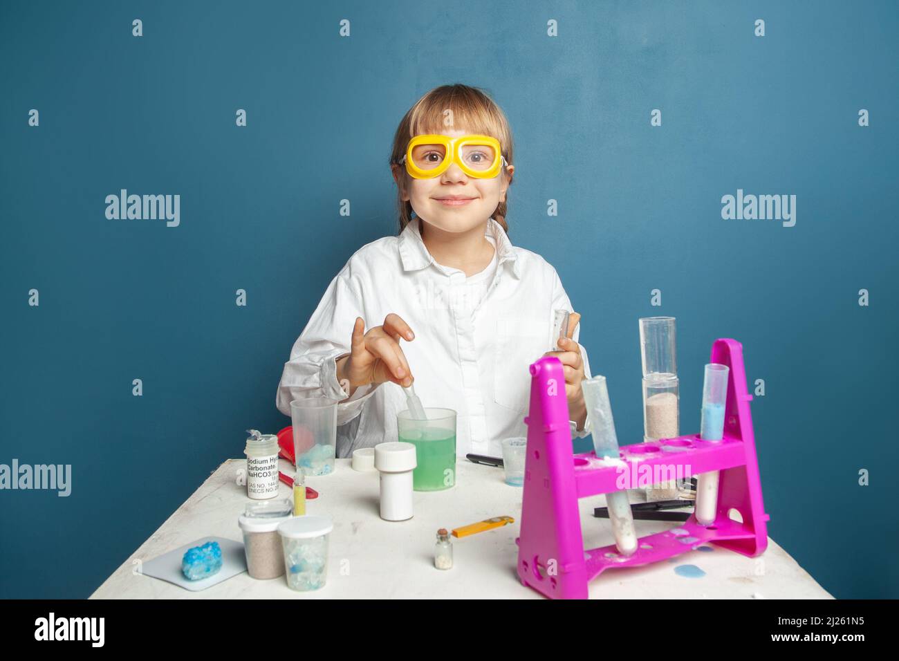 Elementary school kid in science class Stock Photo - Alamy